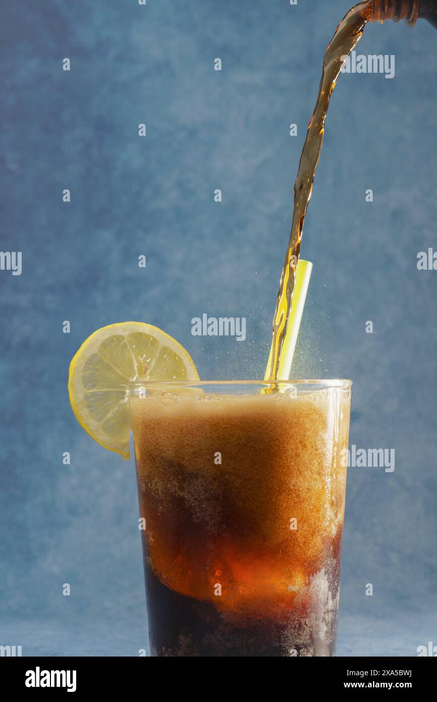 Cola glass lemon falling hi-res stock photography and images - Alamy