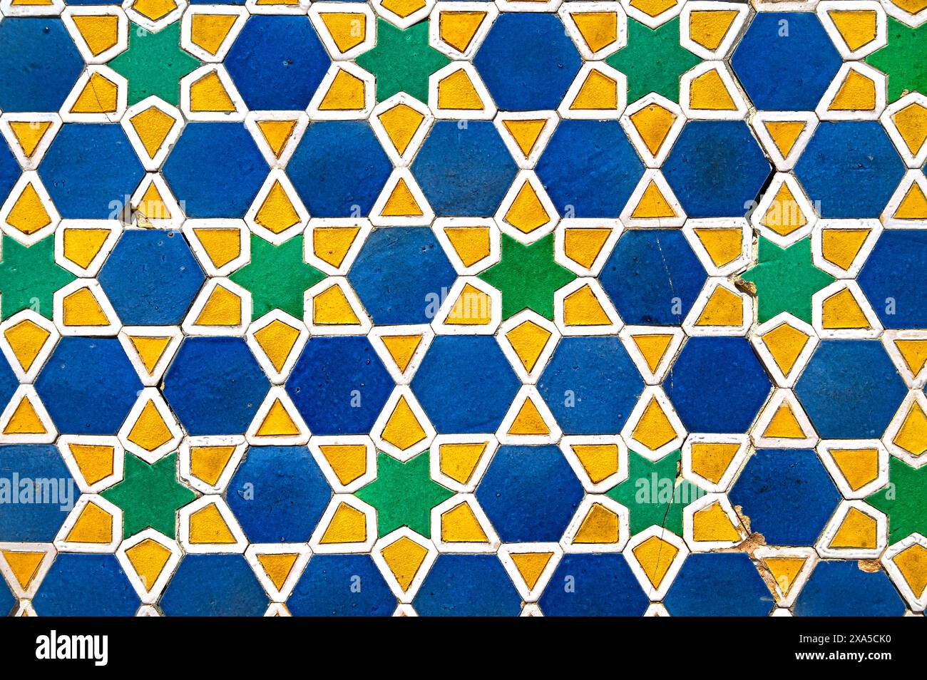 Vintage cracked tile with geometric arabic pattern on the mosque wall ...