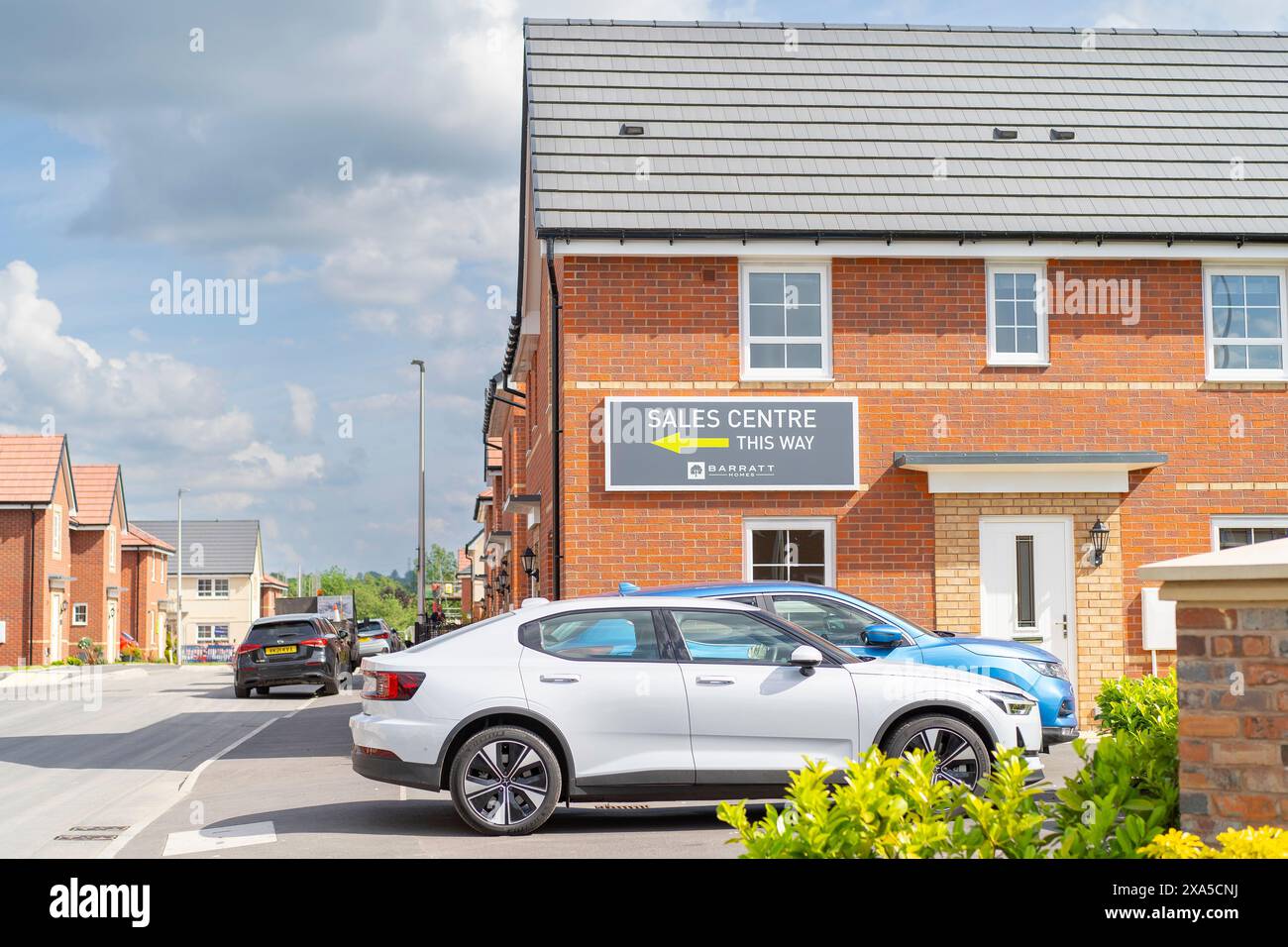 Barratt Homes sales centre sign on the side of a new build home on a ...