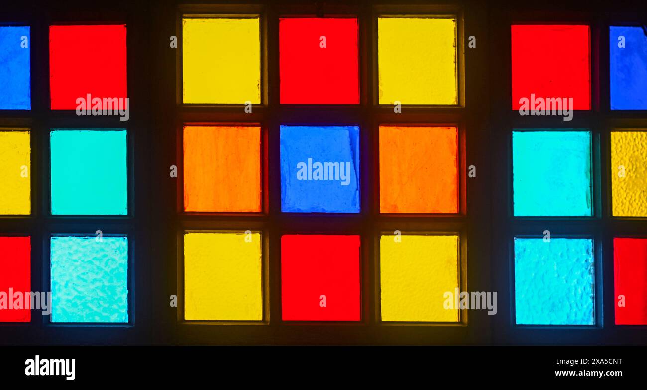 Square stained glass windows as background Stock Photo - Alamy