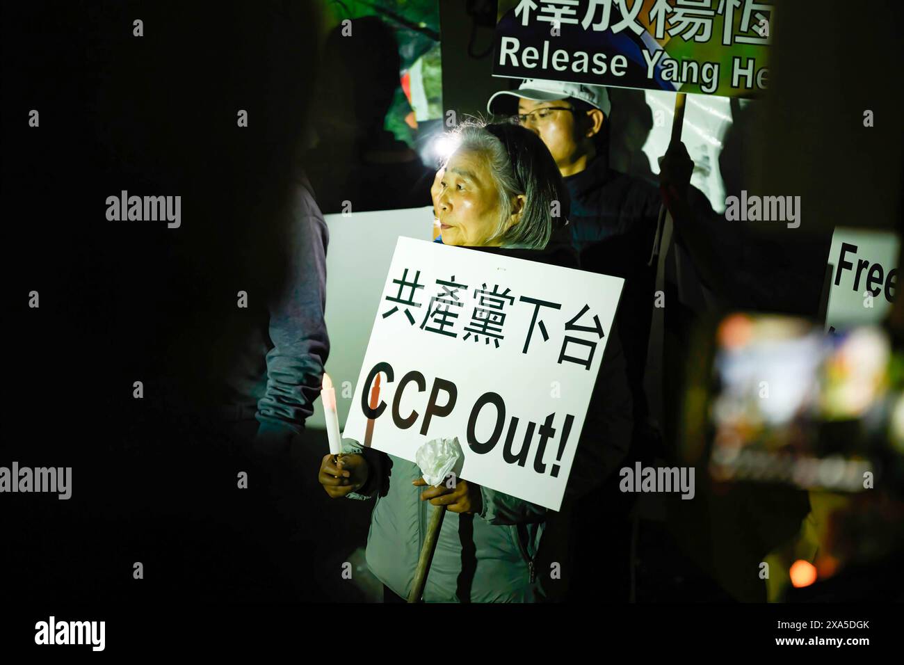 Sydney, Australia. 04th June, 2024. A protester holds a "CCP out ...