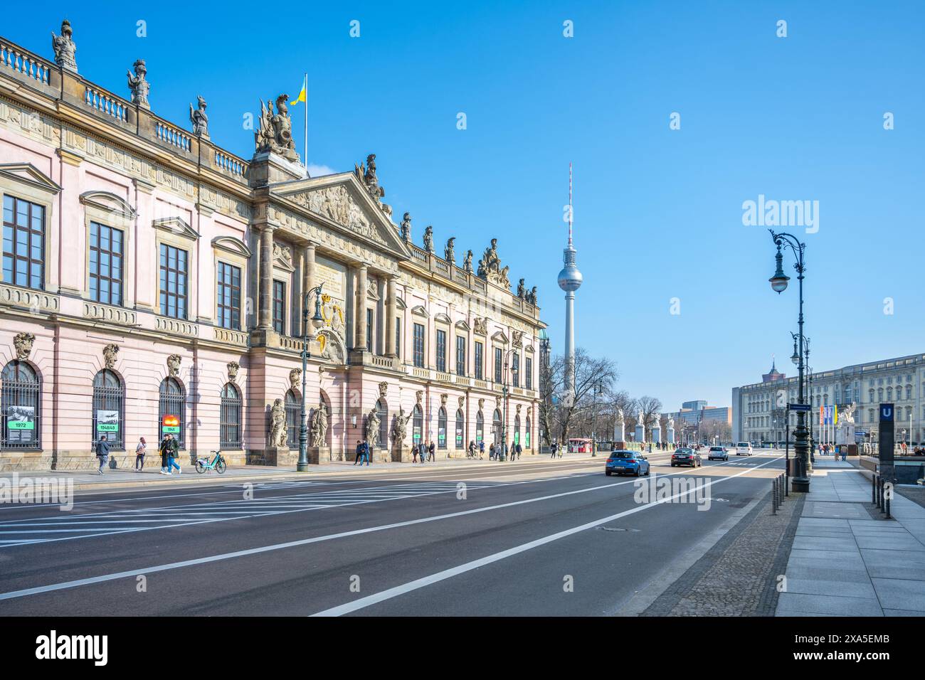 Clear blue skies over the German Historical Museum, with people walking ...