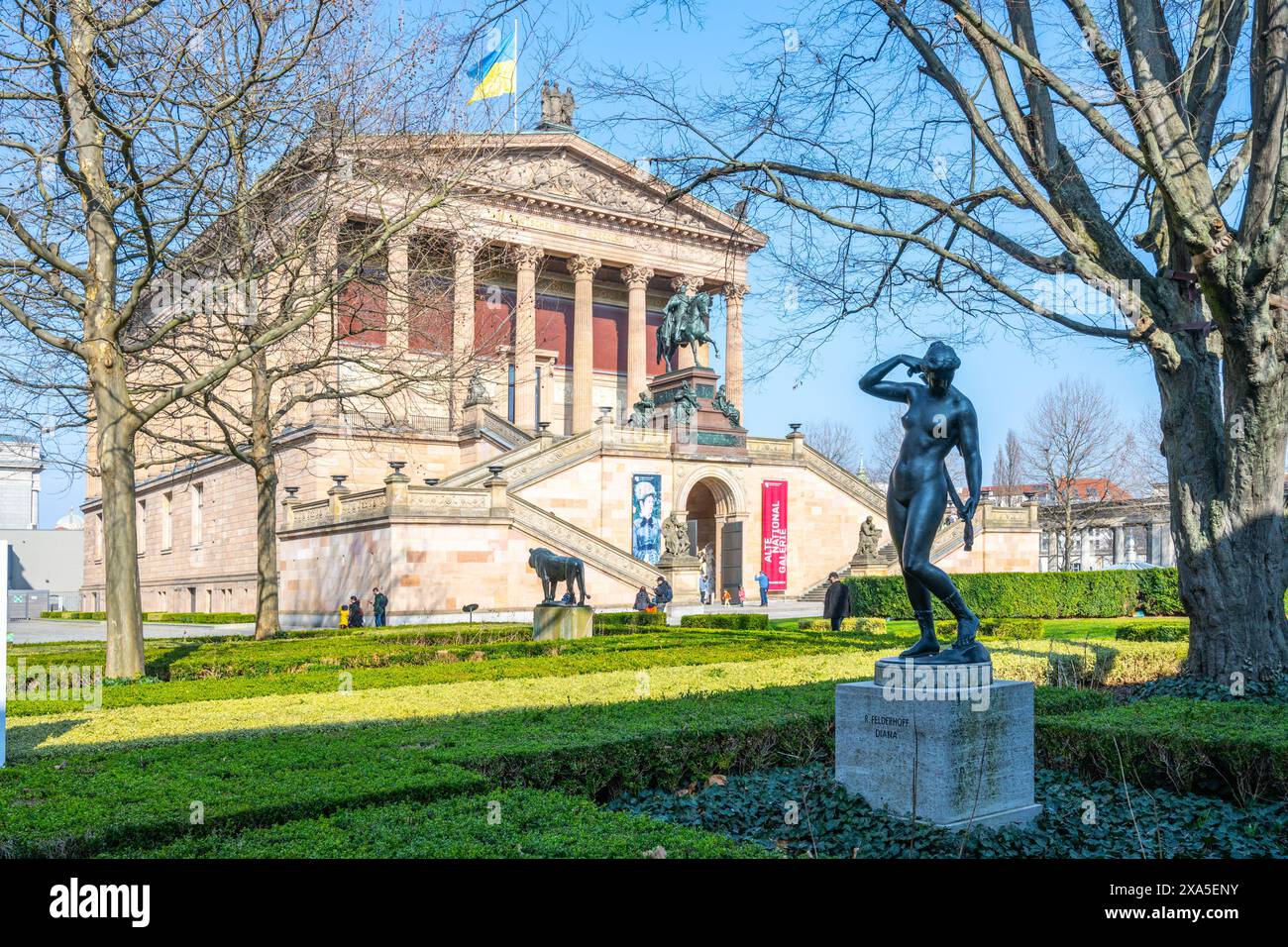 Sculptures adorn the grounds of Berlins Old National Gallery under a ...
