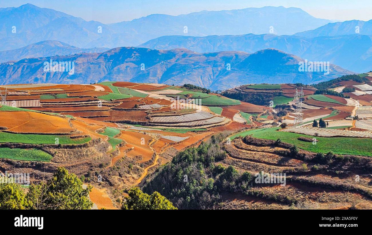 A scenic view of the colorful Qicai Slope in Yunnan, China Stock Photo ...