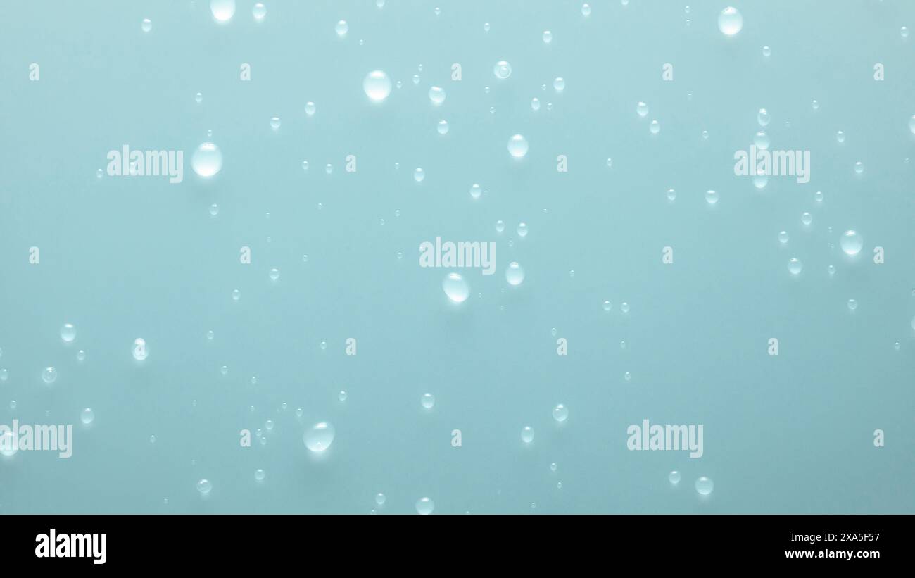 Closeup of Water Droplets on a Smooth Blue Surface Stock Photo - Alamy