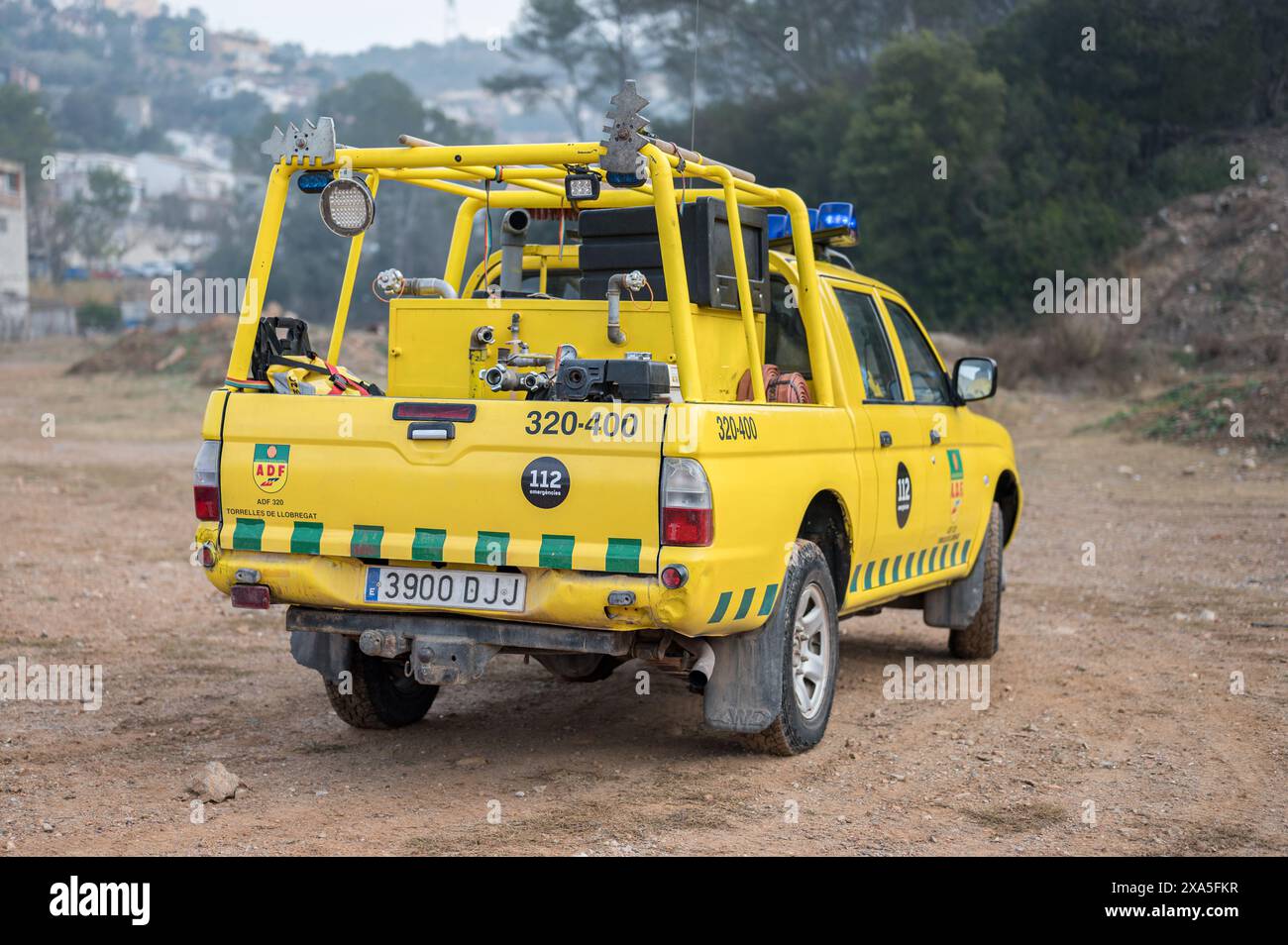 A yellow Mitsubishi L200 pickup truck with sirens from the town's ...
