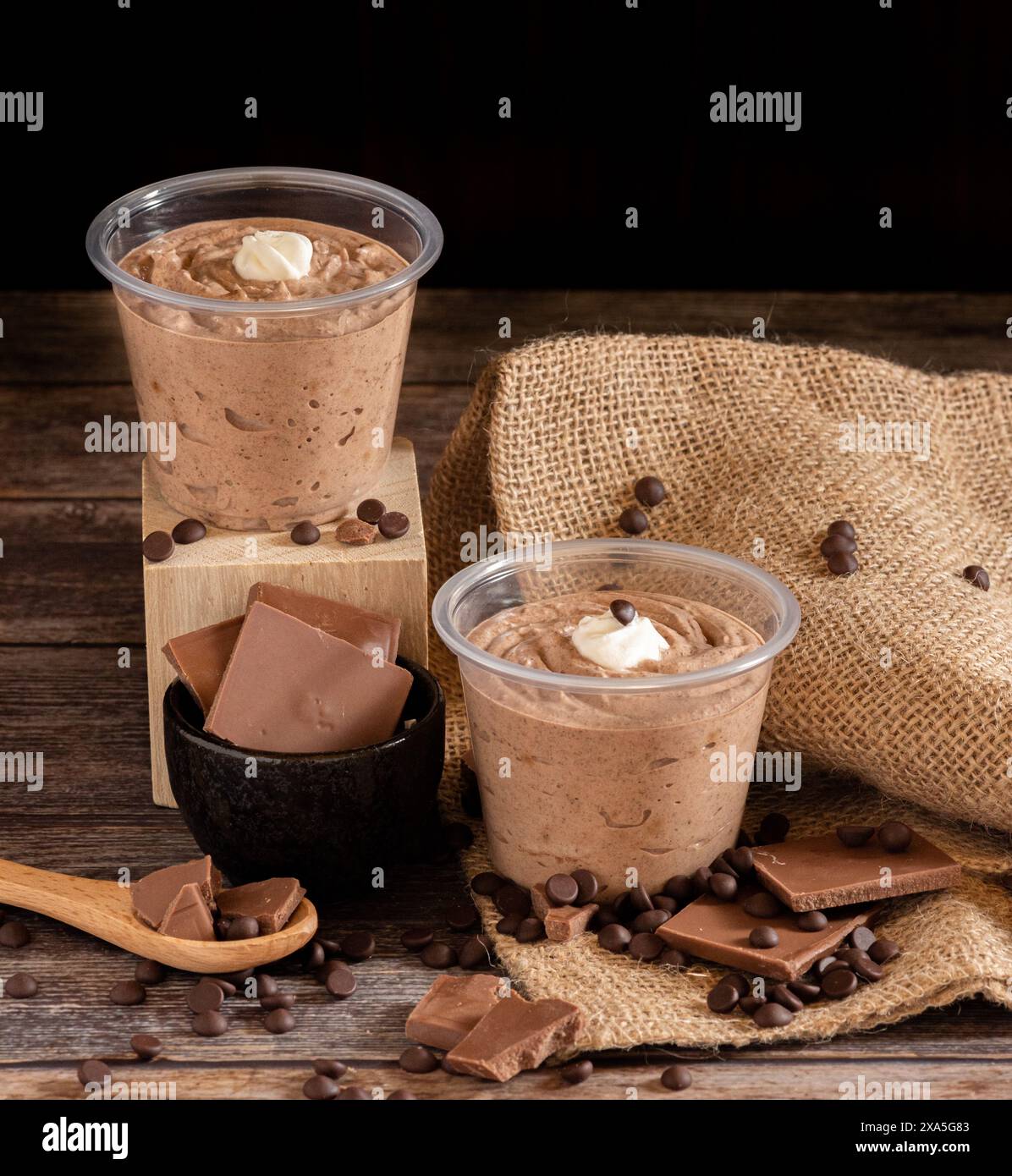 A chocolate and whipped chocolate desserts served in cups Stock Photo ...
