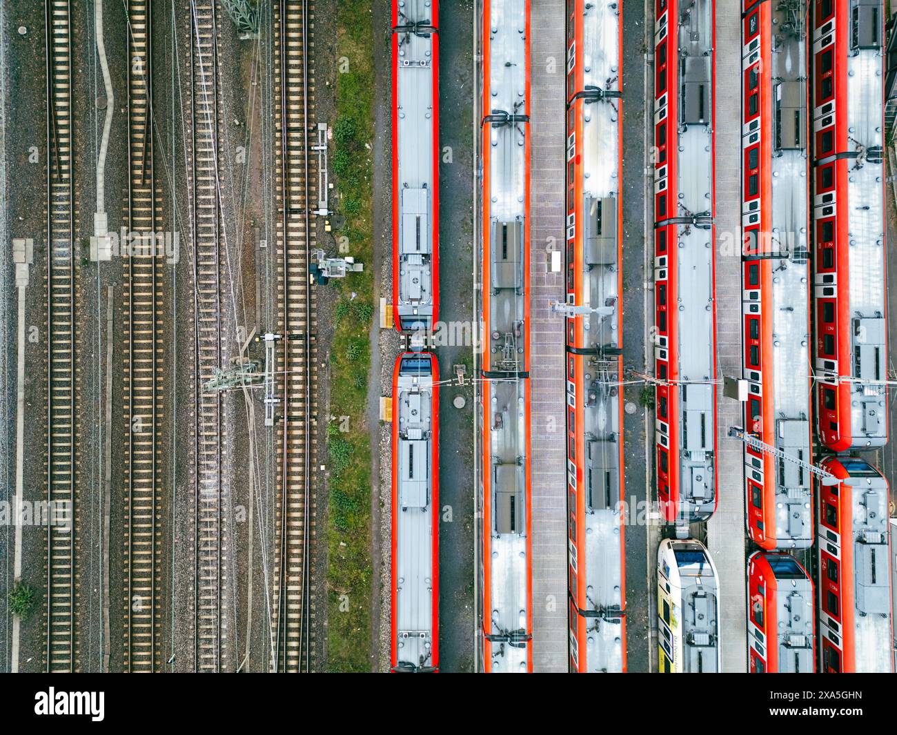 Top down view of many red trains and the train tracks Stock Photo - Alamy