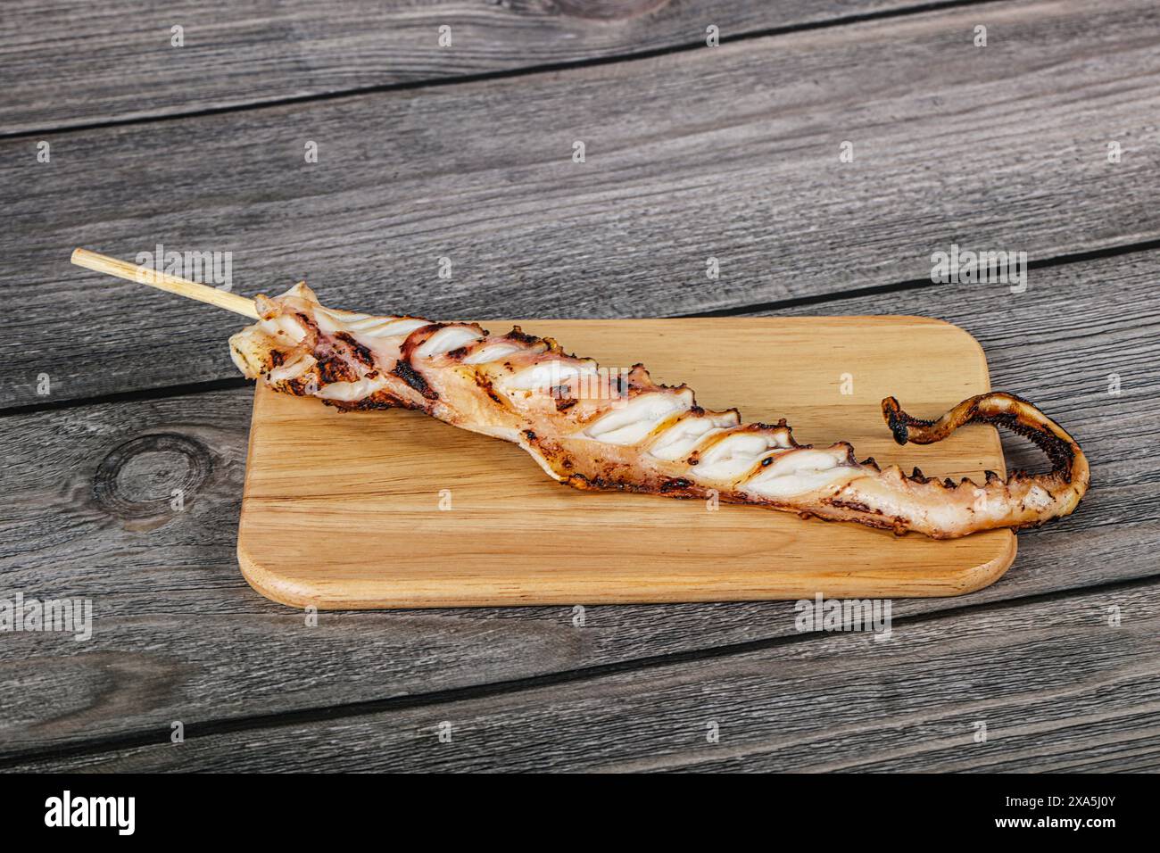 Delicous tasty Grilled octopus tentacle snack Stock Photo - Alamy