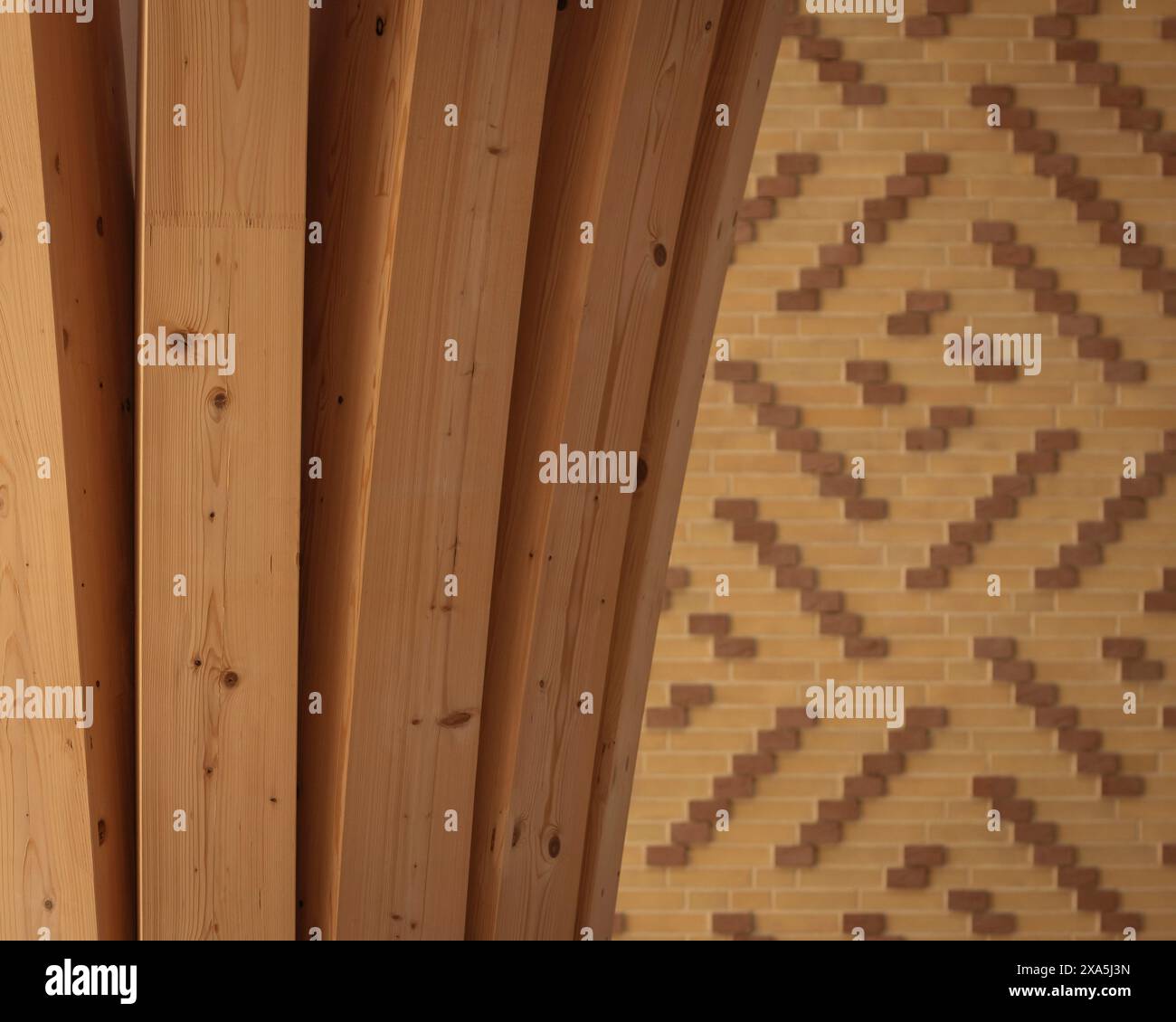 Interior detail of timber column with patterned tile detail in ...