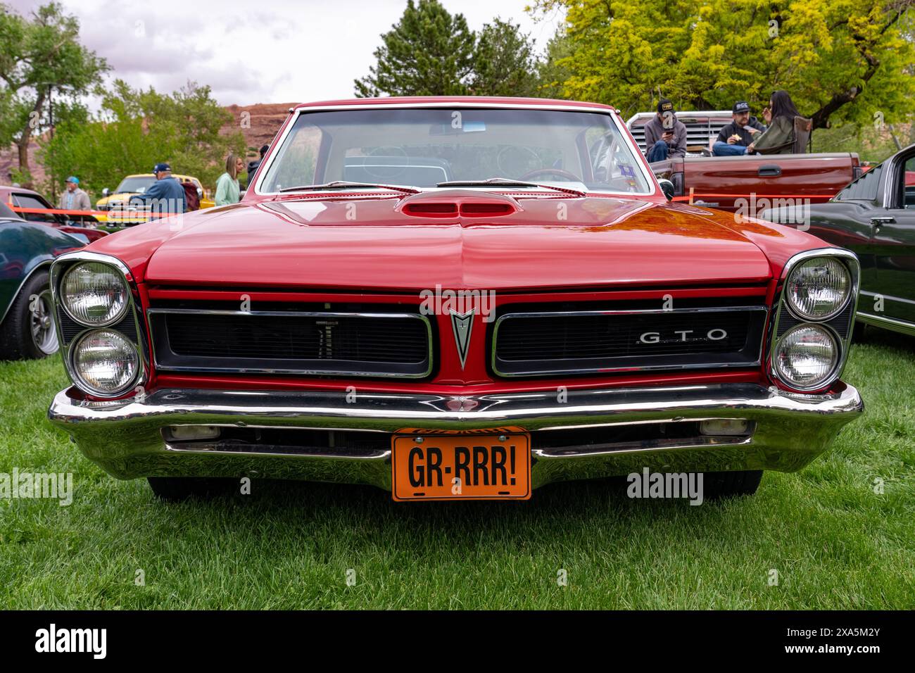 A restored 1965 Pontiac GTO muscle car in the Moab Rotary Car Show in ...
