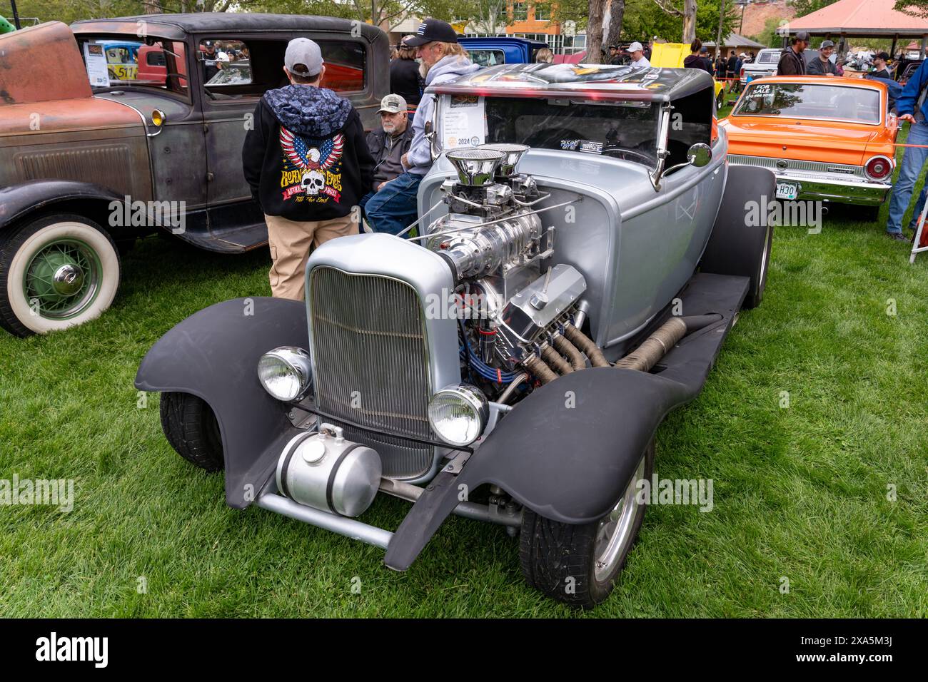 A customized 1932 Ford Model A Roadster with a supercharged V-8 engine ...