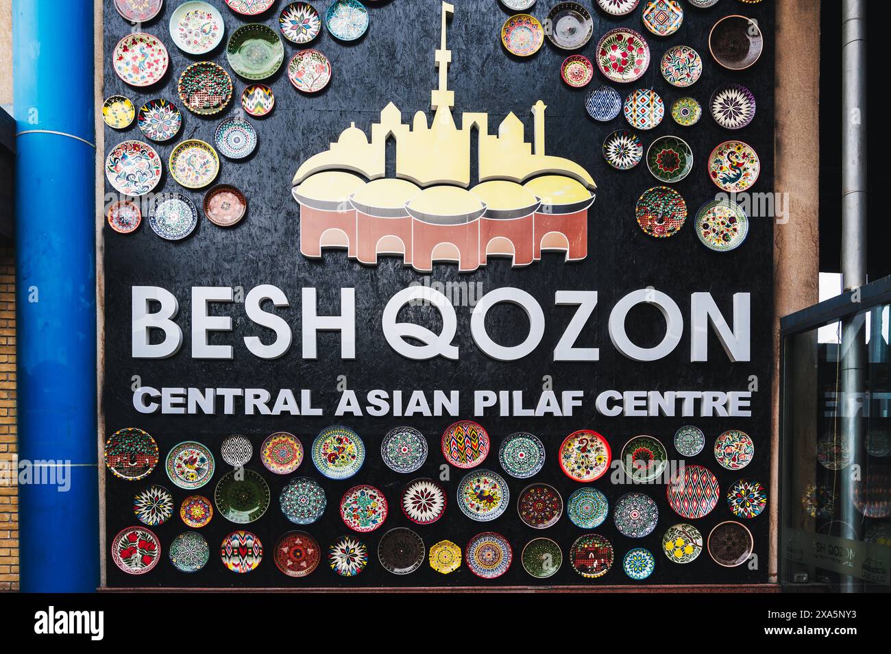 Advertising sign of cafe Central Asian Pilaf Center Besh Qozon ...