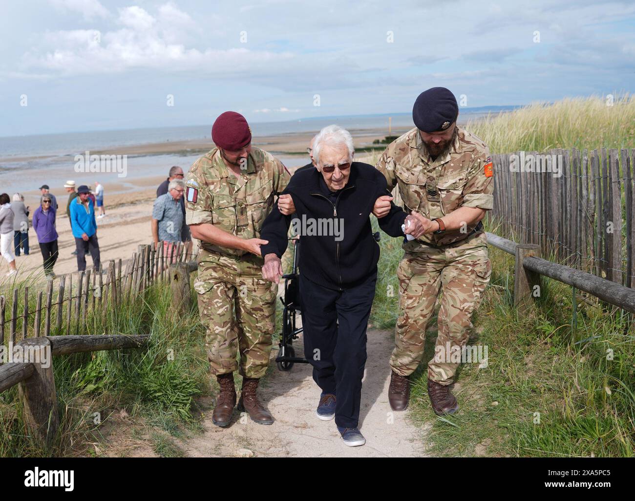 Corporal Aaron Stone and Sergeant Ben Beale help veteran John Life ...