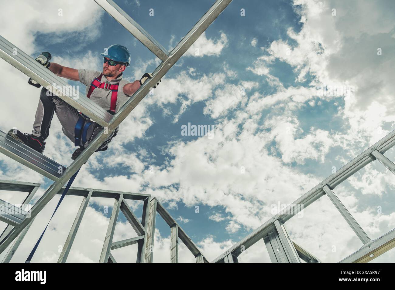 The Caucasian Male Construction Worker Assembling Aluminum Structure ...