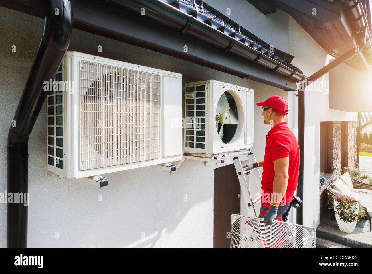 Install heat pump hi-res stock photography and images - Alamy