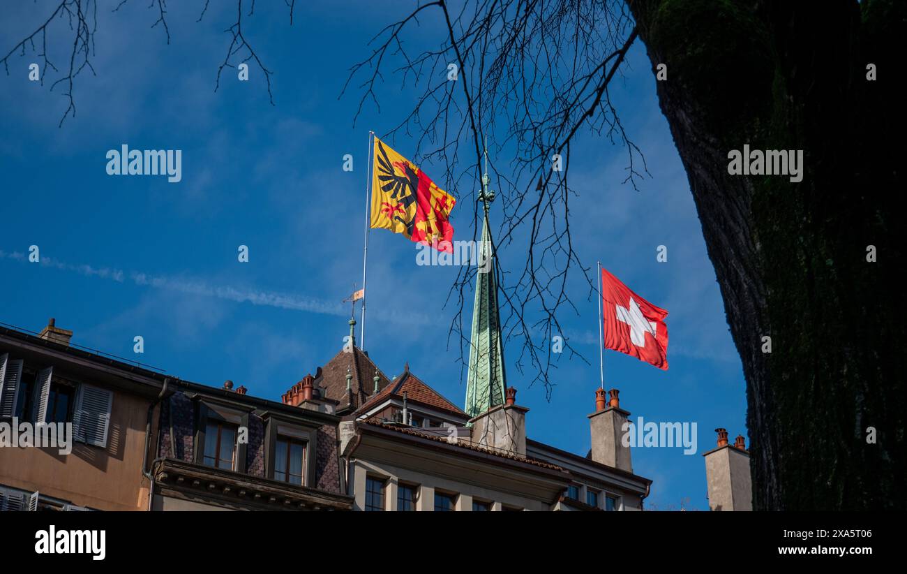 The Flags of the canton of Geneva and Switzerland flying over St Peter ...