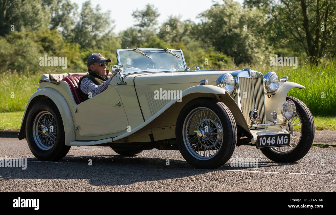 Stony Stratford,UK - June 2nd 2024: 1947 cream MG Midget classic ...