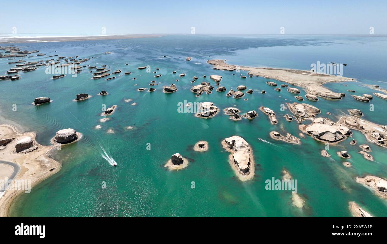 An aerial photo is showing the landscape of Usut (over water) Yadan ...