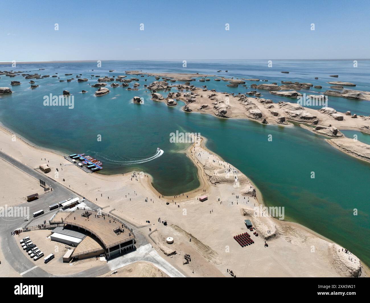 An aerial photo is showing the landscape of Usut (over water) Yadan ...