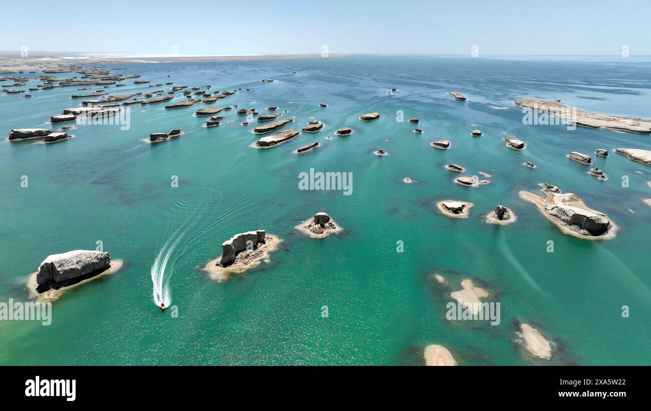 An aerial photo is showing the landscape of Usut (over water) Yadan ...