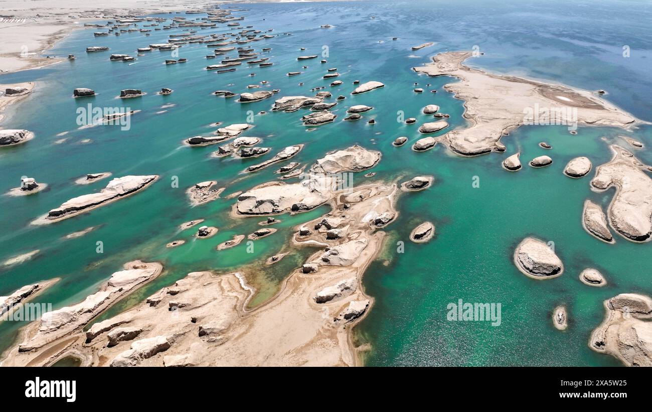 An aerial photo is showing the landscape of Usut (over water) Yadan ...