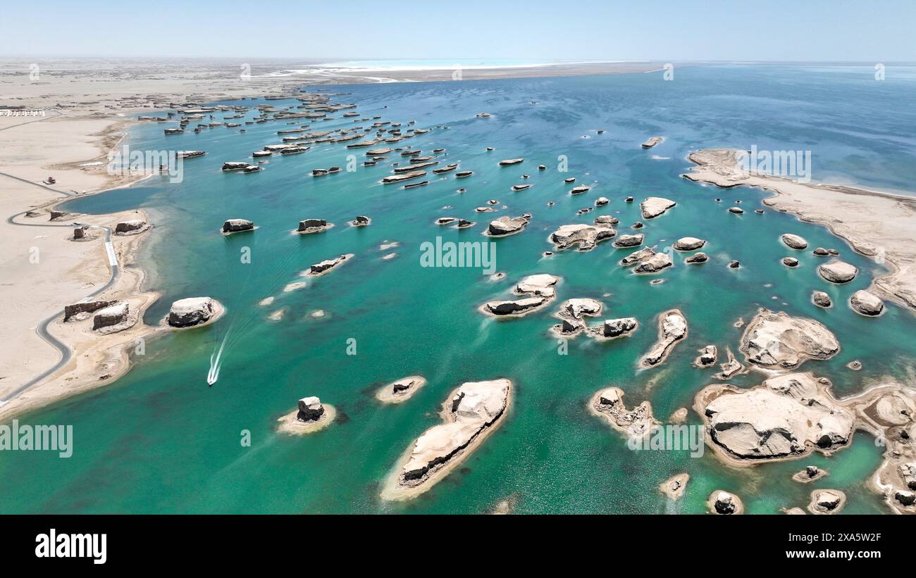 An aerial photo is showing the landscape of Usut (over water) Yadan ...