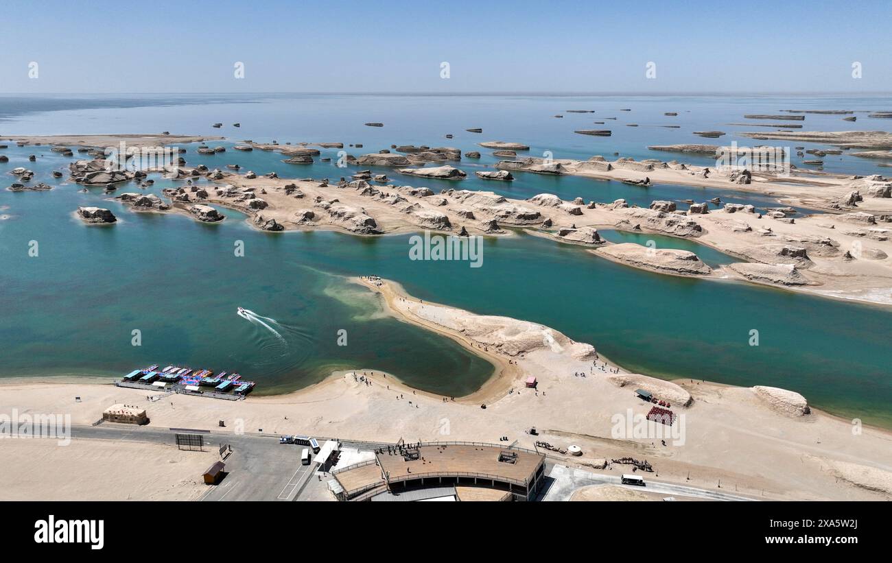 An aerial photo is showing the landscape of Usut (over water) Yadan ...