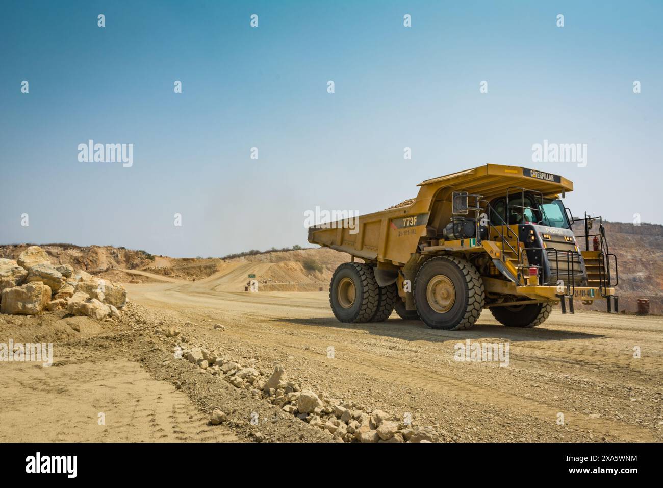 Big construction Caterpillar truck in the middle of a quarry Stock ...