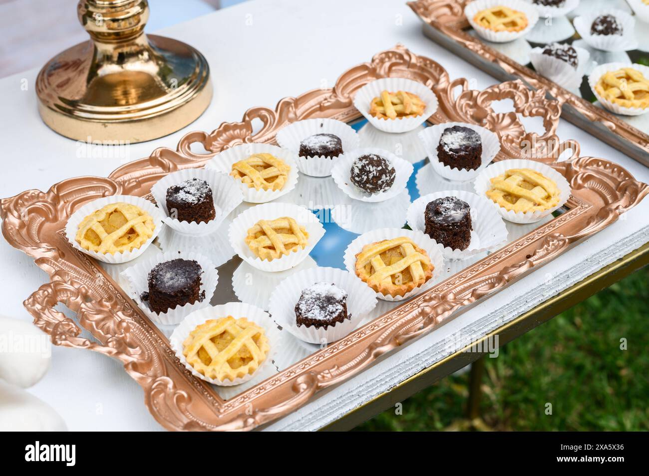 Delicious selection of bite-sized desserts beautifully displayed on a ...