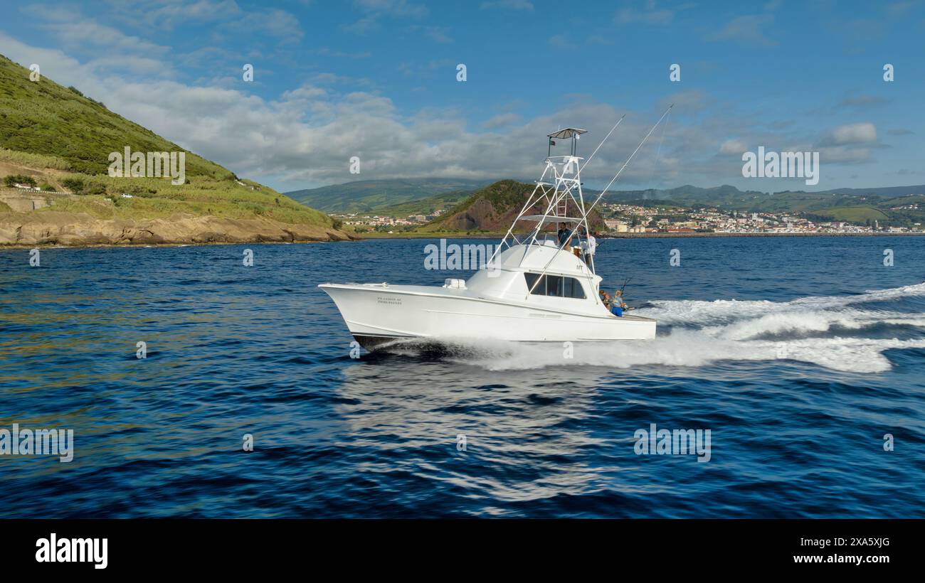 sportfishing boat fishing in the atlantic ocean for blue marlin in the ...