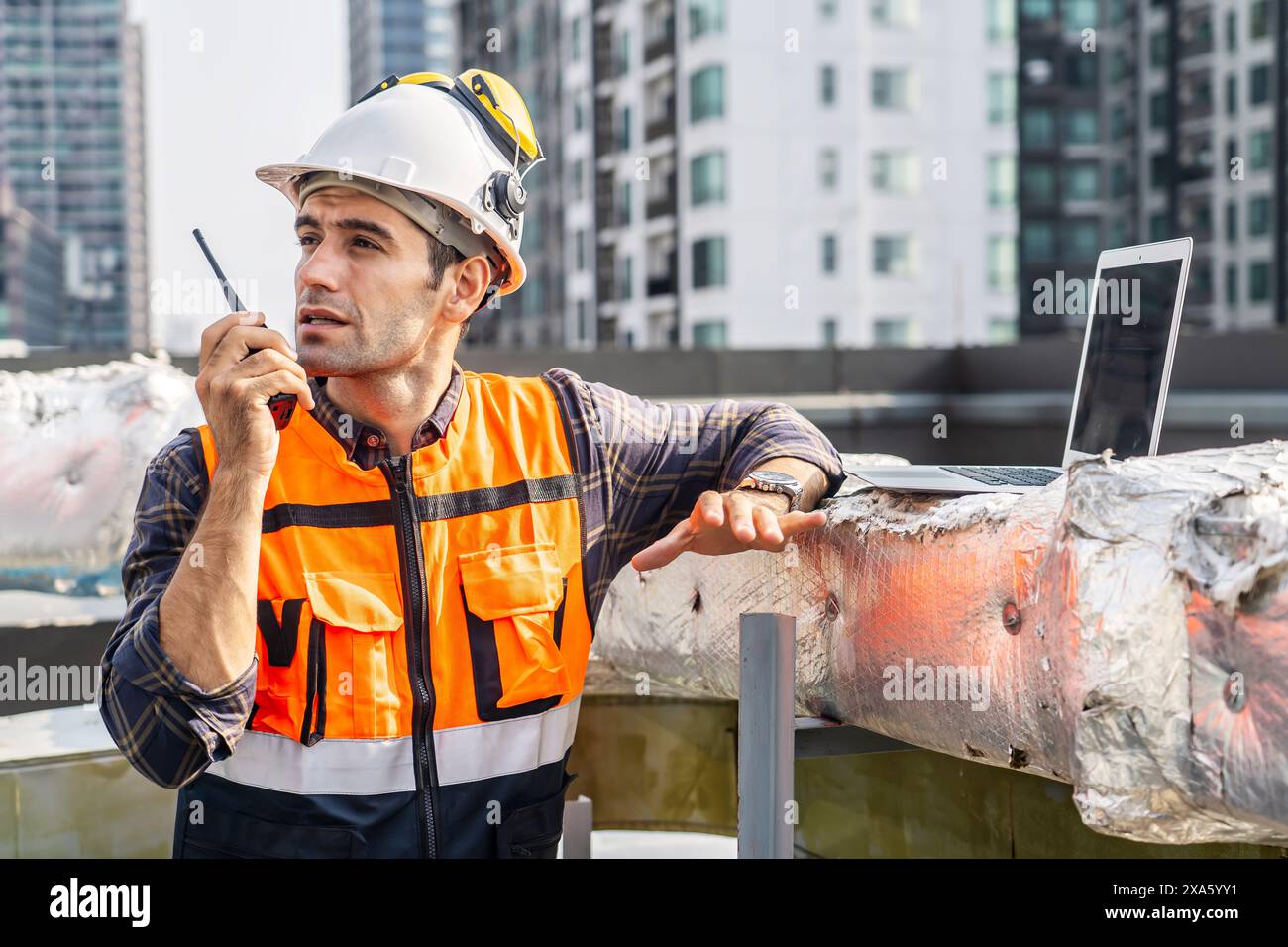 A technical foreman chatting on radio about building systems ...