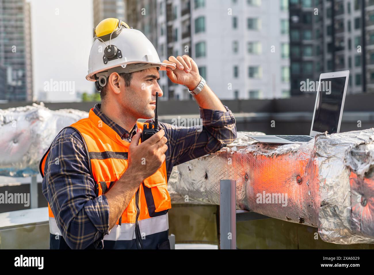 A technical foreman chatting on radio about building systems ...