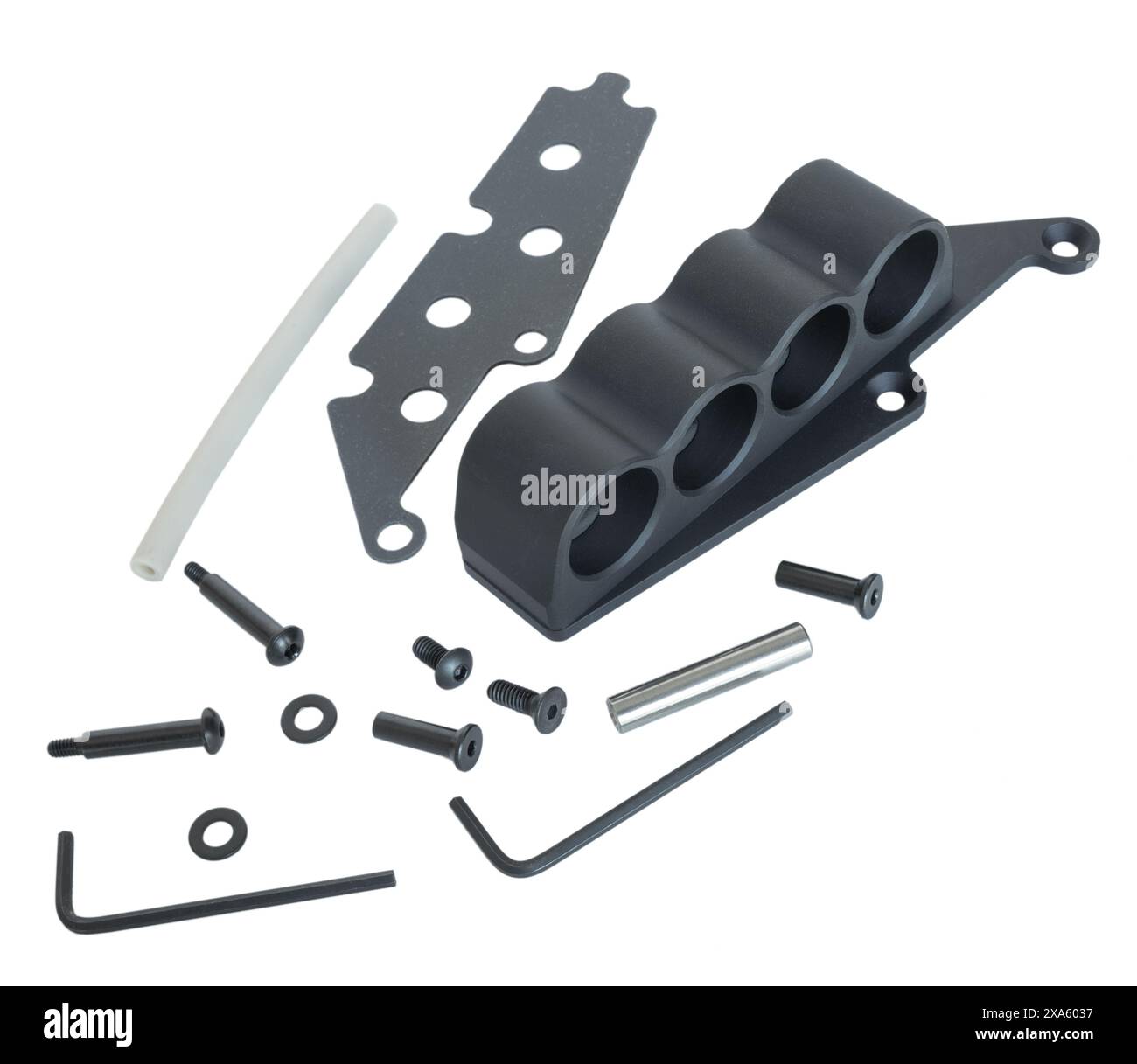 Isolated parts and tools required to install a sidesaddle shotshell ...
