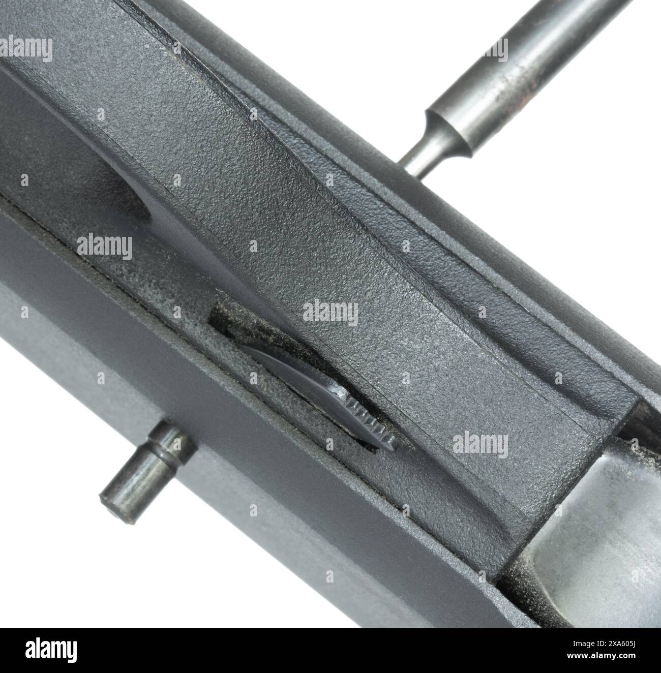 Trigger group retaining pin being driven on a pump action shotwun with ...