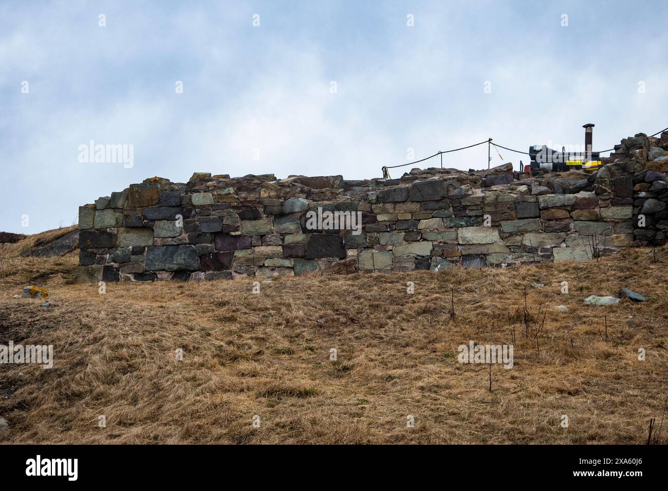 Stone retaining wall in Louisbourg, Nova Scotia, Canada Stock Photo - Alamy