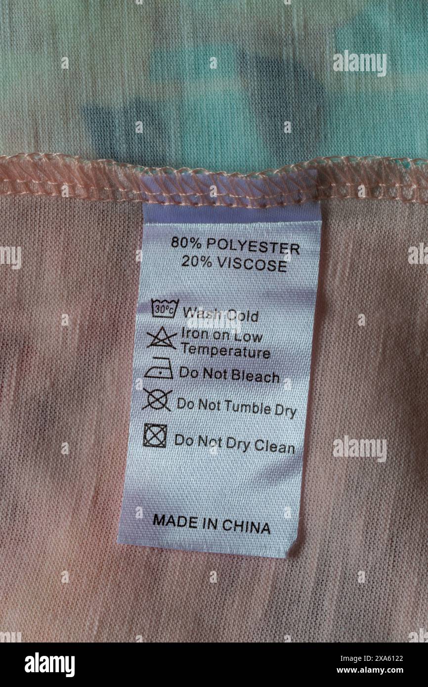 wash care instructions and symbols on label in garment clothing made in ...