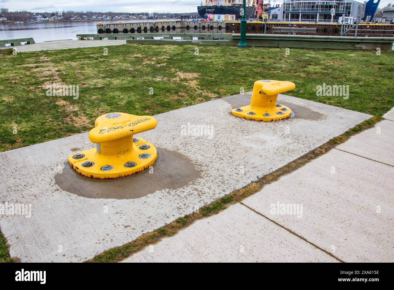Yellow bollards displayed at the waterfront in Sydney, Nova Scotia ...