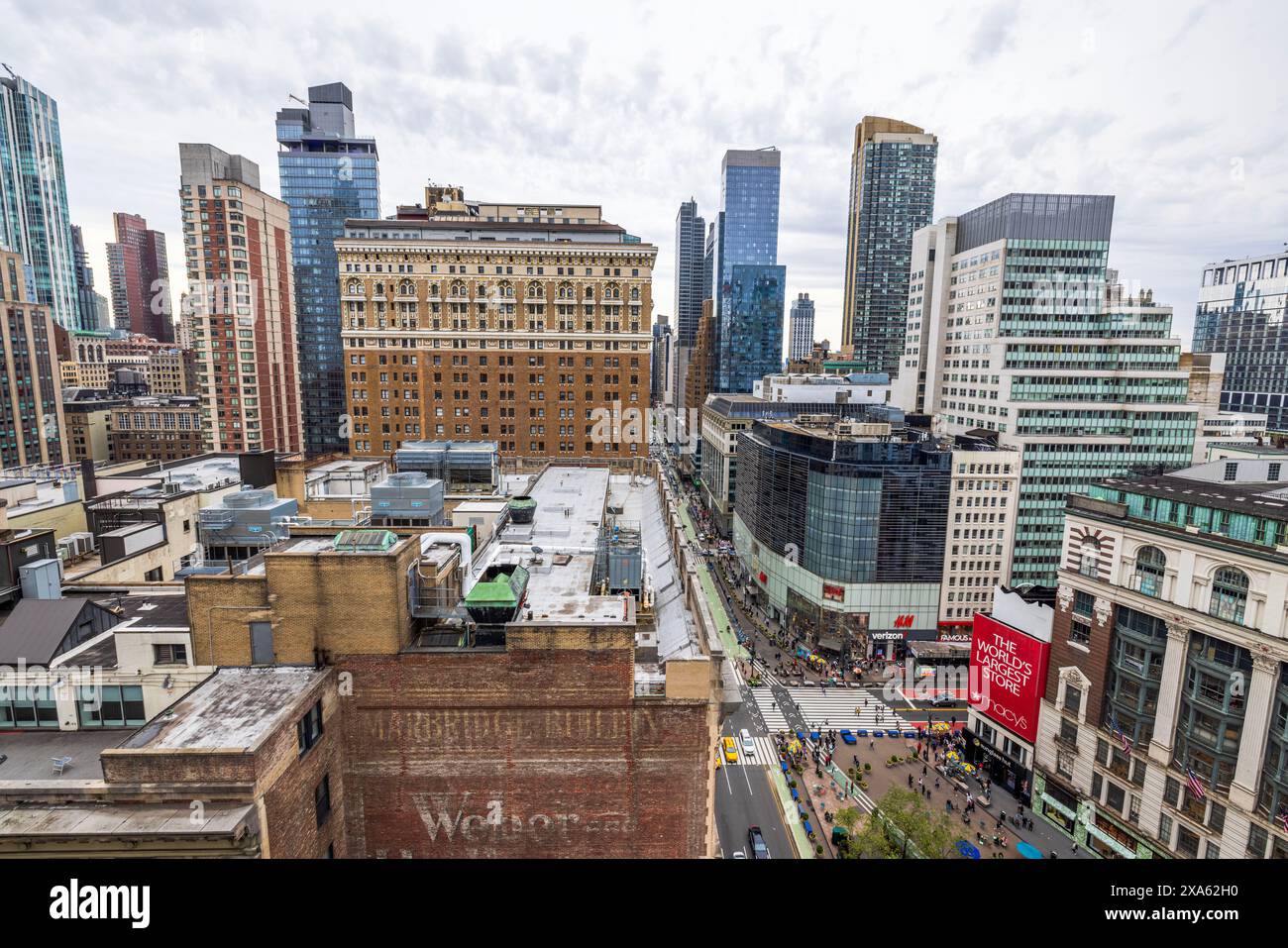 Aerial view of Macy's department store facade, 6th Avenue, and Broadway ...