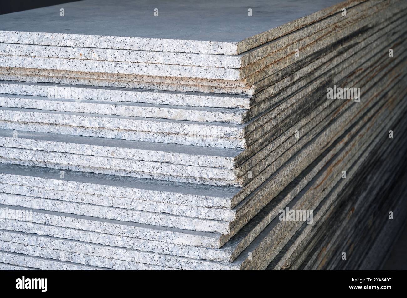 stack of white marble slabs on the construction site for the decoration ...