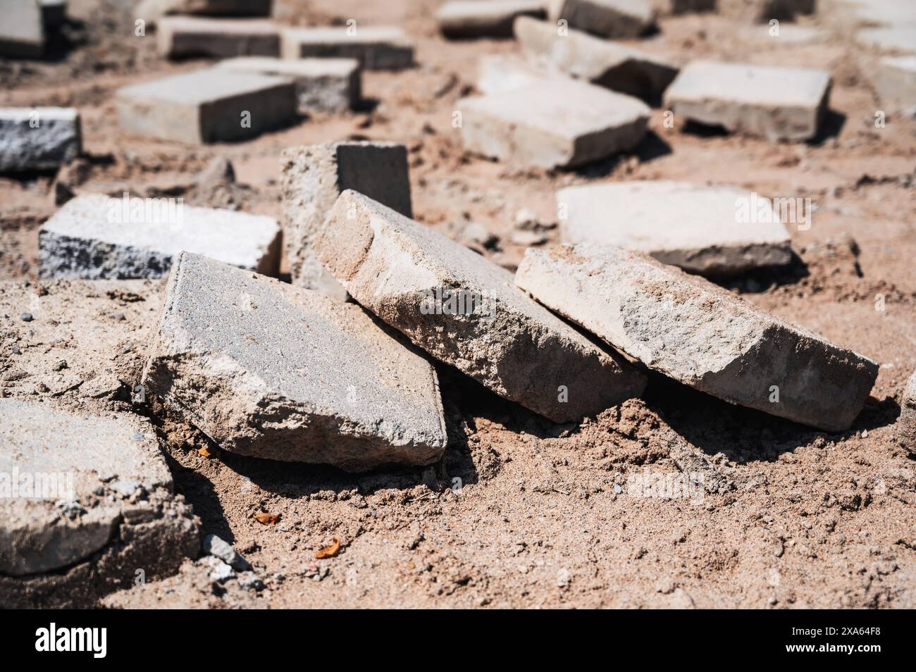 paving slabs on the destroyed damaged pedestrian sidewalk close-up ...