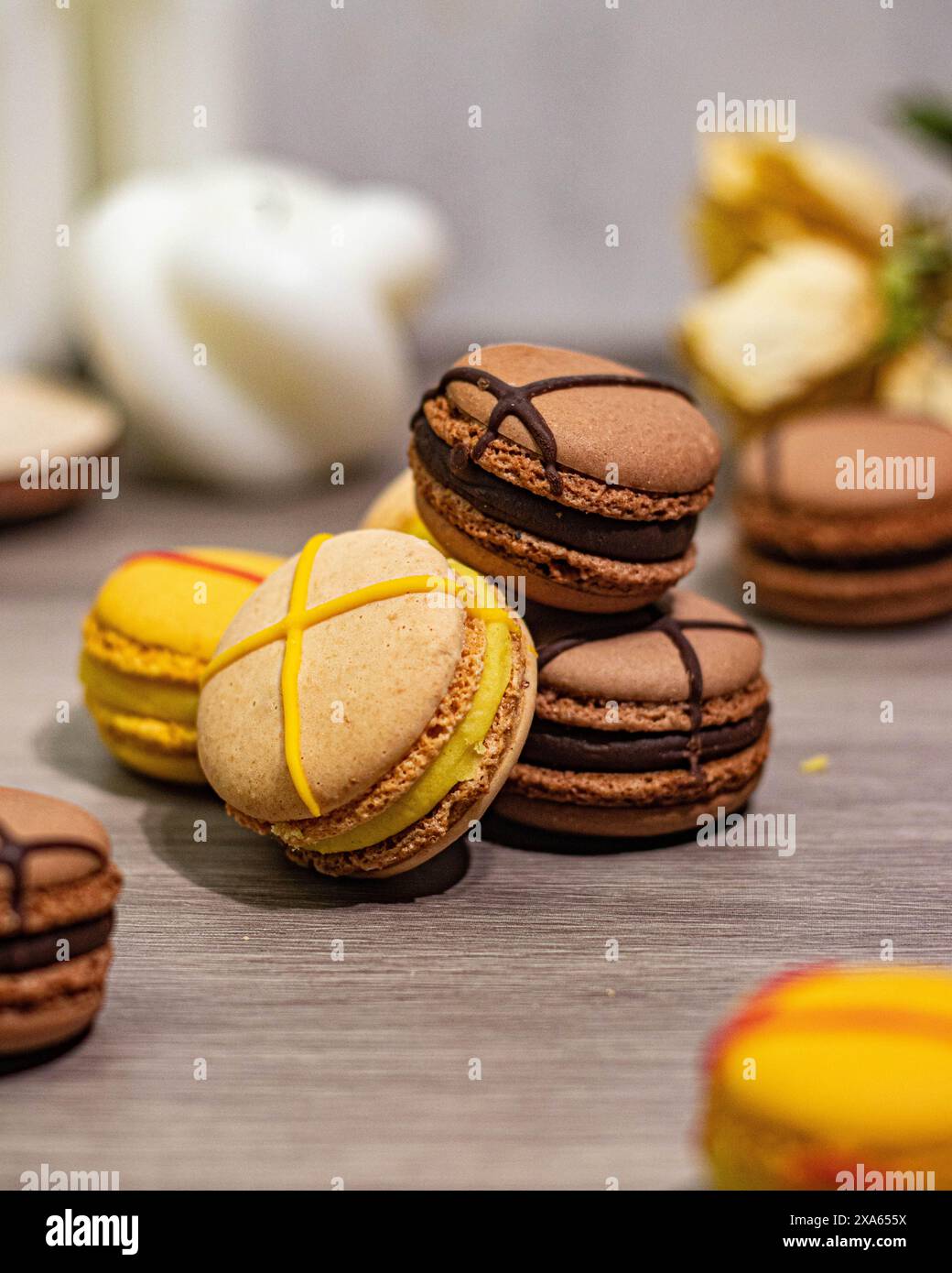 The Colorful macarons and assorted sweets displayed on a table Stock ...