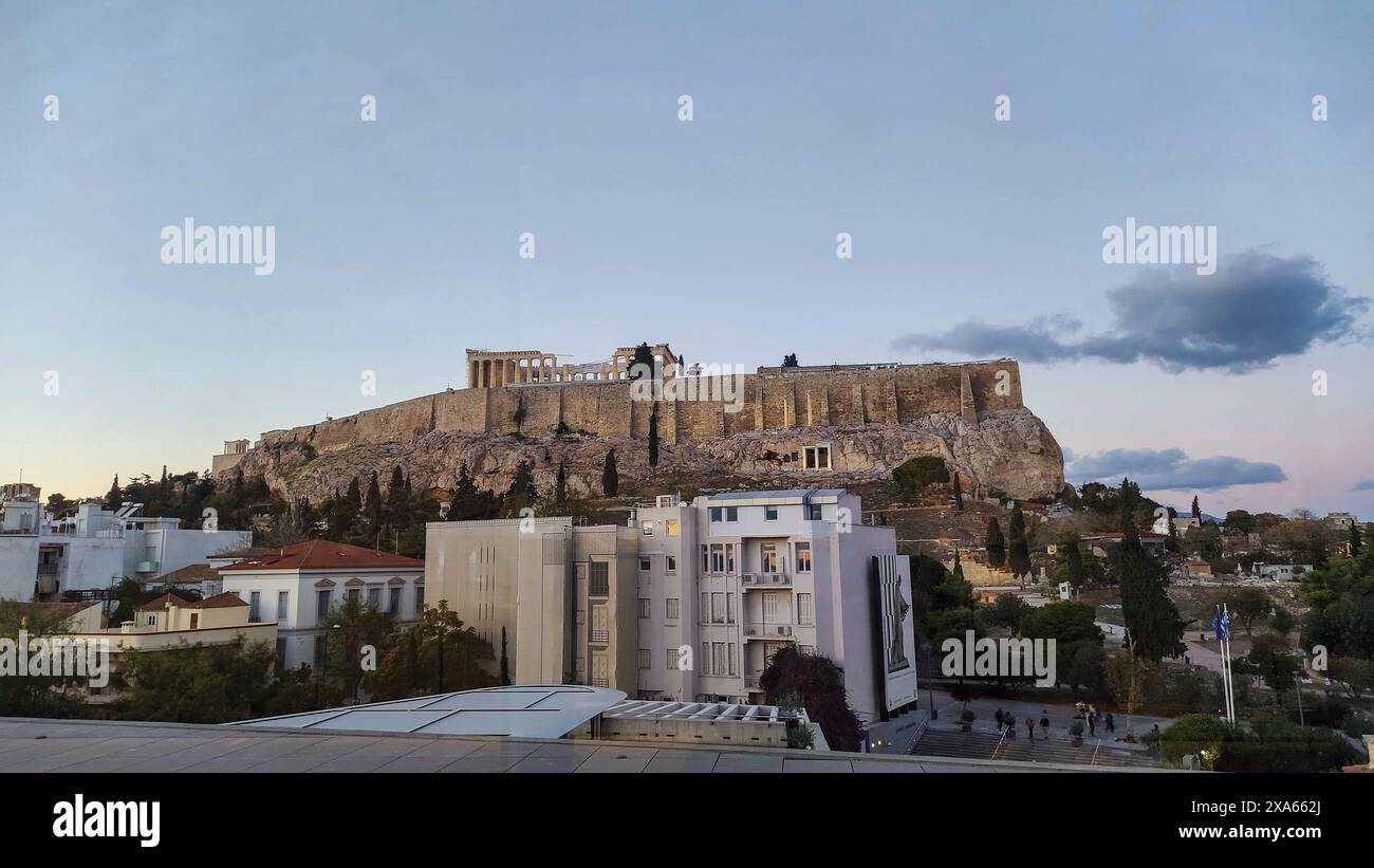 A scenic view of Athens, Greece with ancient ruins against a backdrop ...
