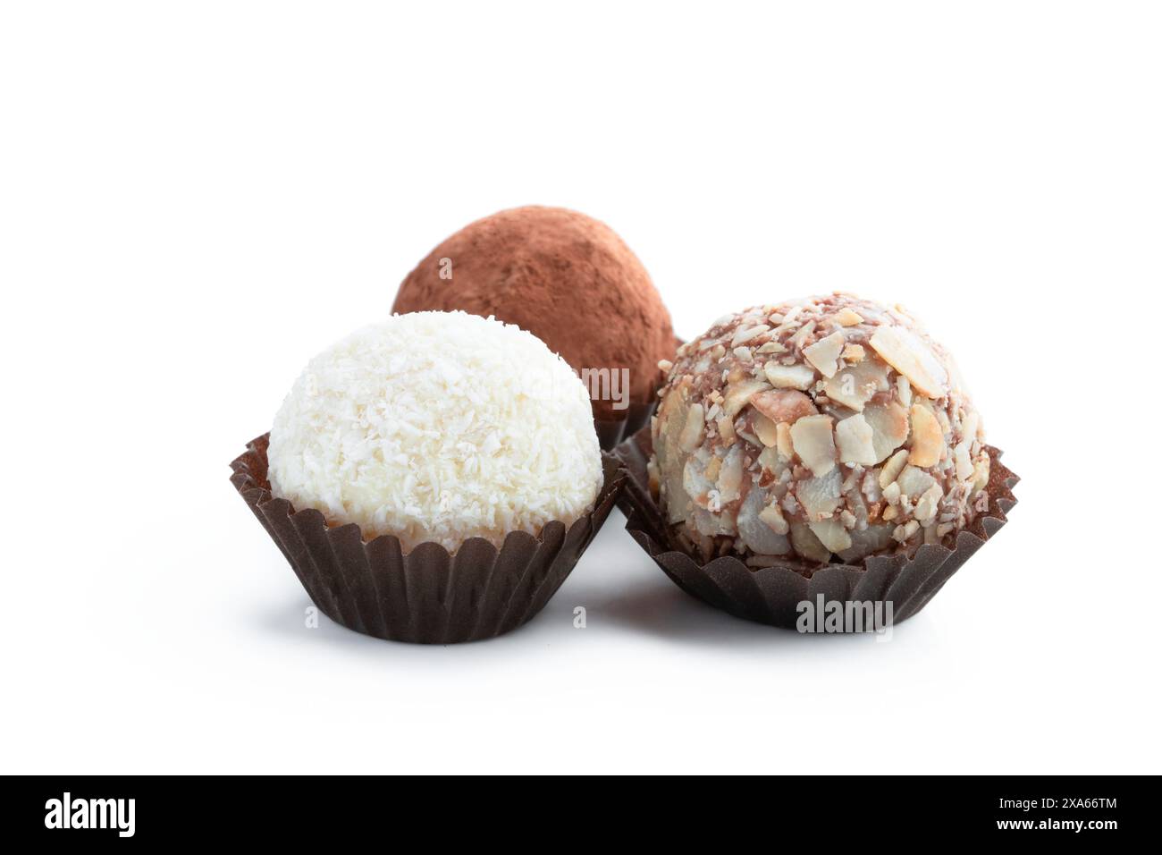 Delicious truffles with variety sprinkling isolated on white Stock ...