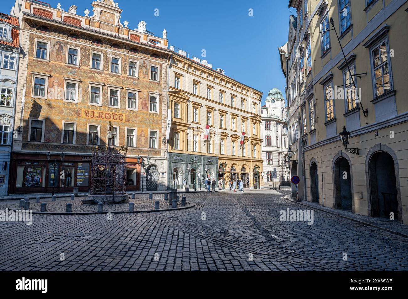 A Historic Prague street corner with cobblestone and old buildings in ...