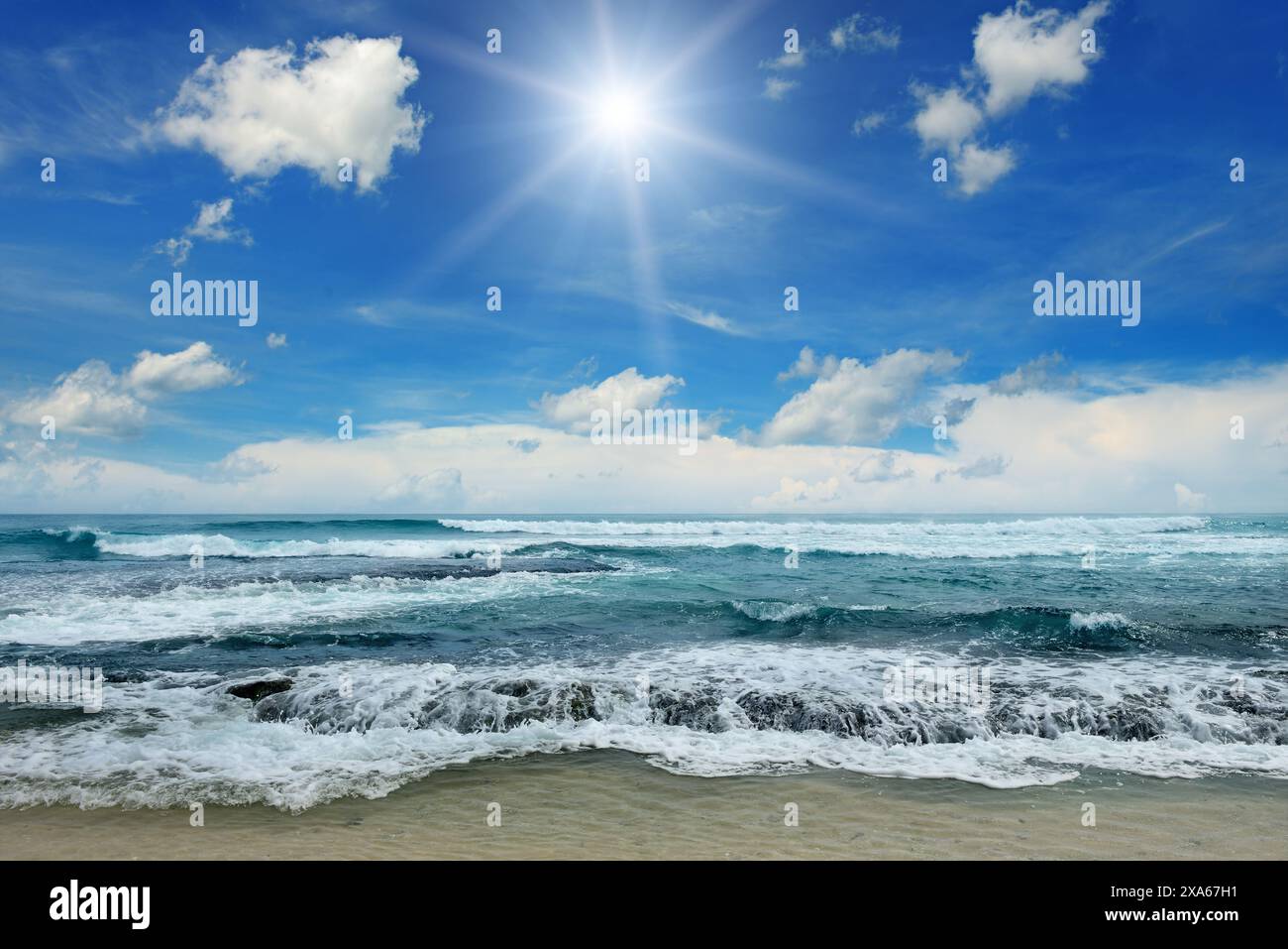 sun over sea and blue sky Stock Photo - Alamy