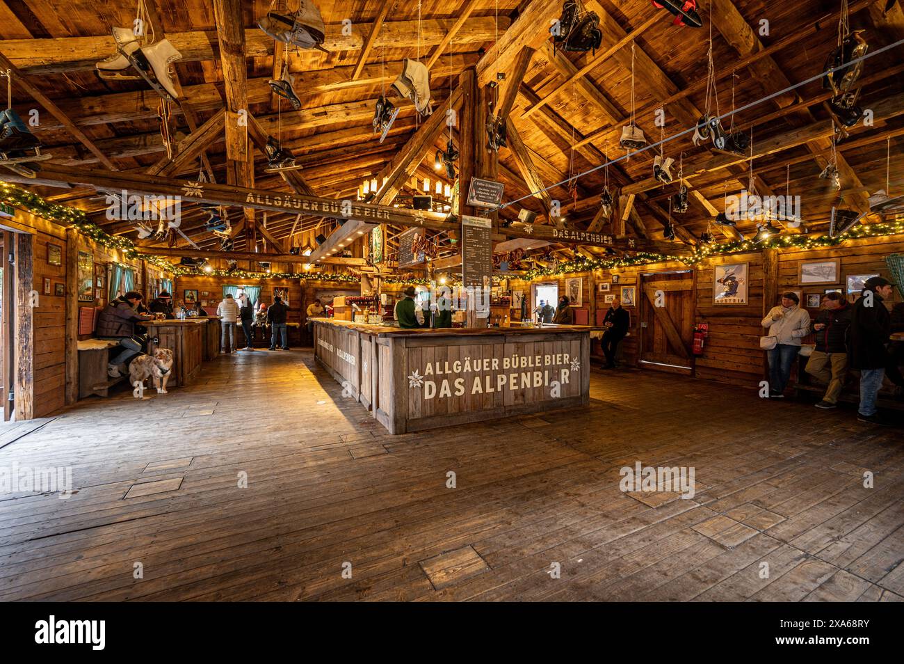 A spacious wooden bar in a rustic room in Cologne, Germany Stock Photo ...