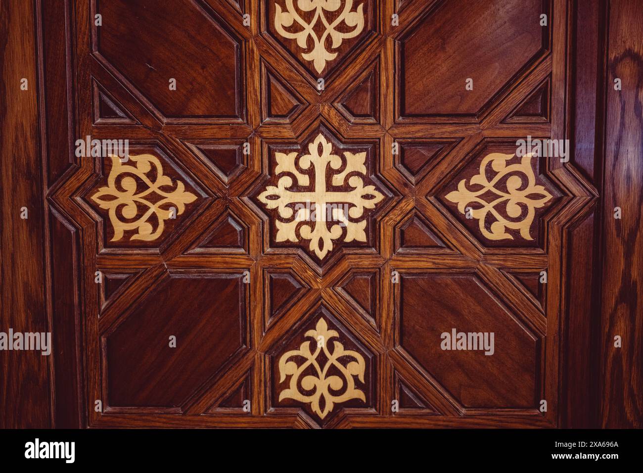 Intricate wooden carving on building entrance with ornate details Stock ...