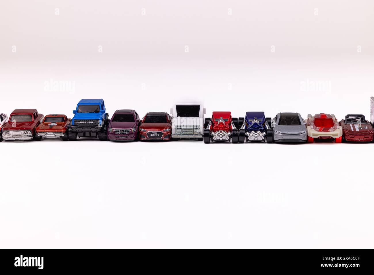 A collection of toy cars parked together Stock Photo - Alamy