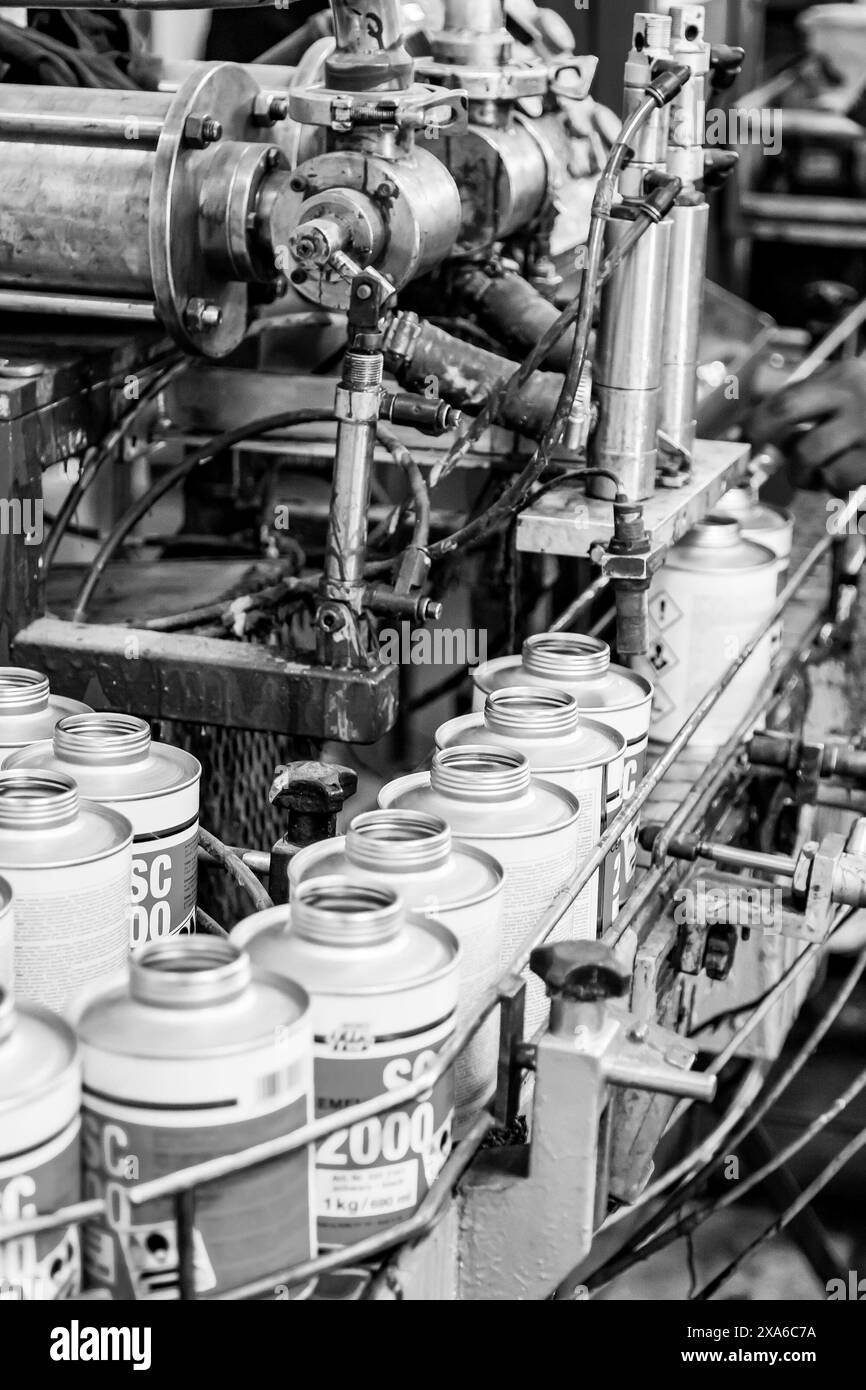 The interior of a glue and adhesives assembly line in a factory in ...